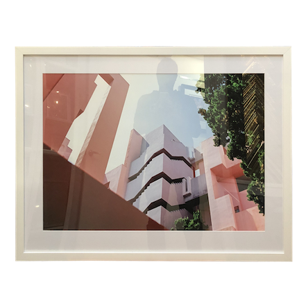 Contemporary Photo Part of Series Framed in a White Frame With Mat Board