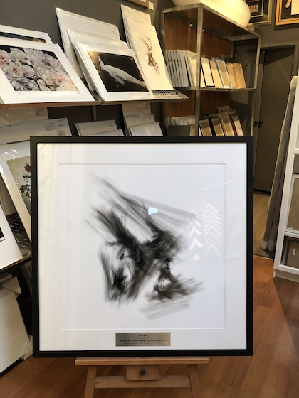 A Photographic Print Framed in a Black Timber Frame